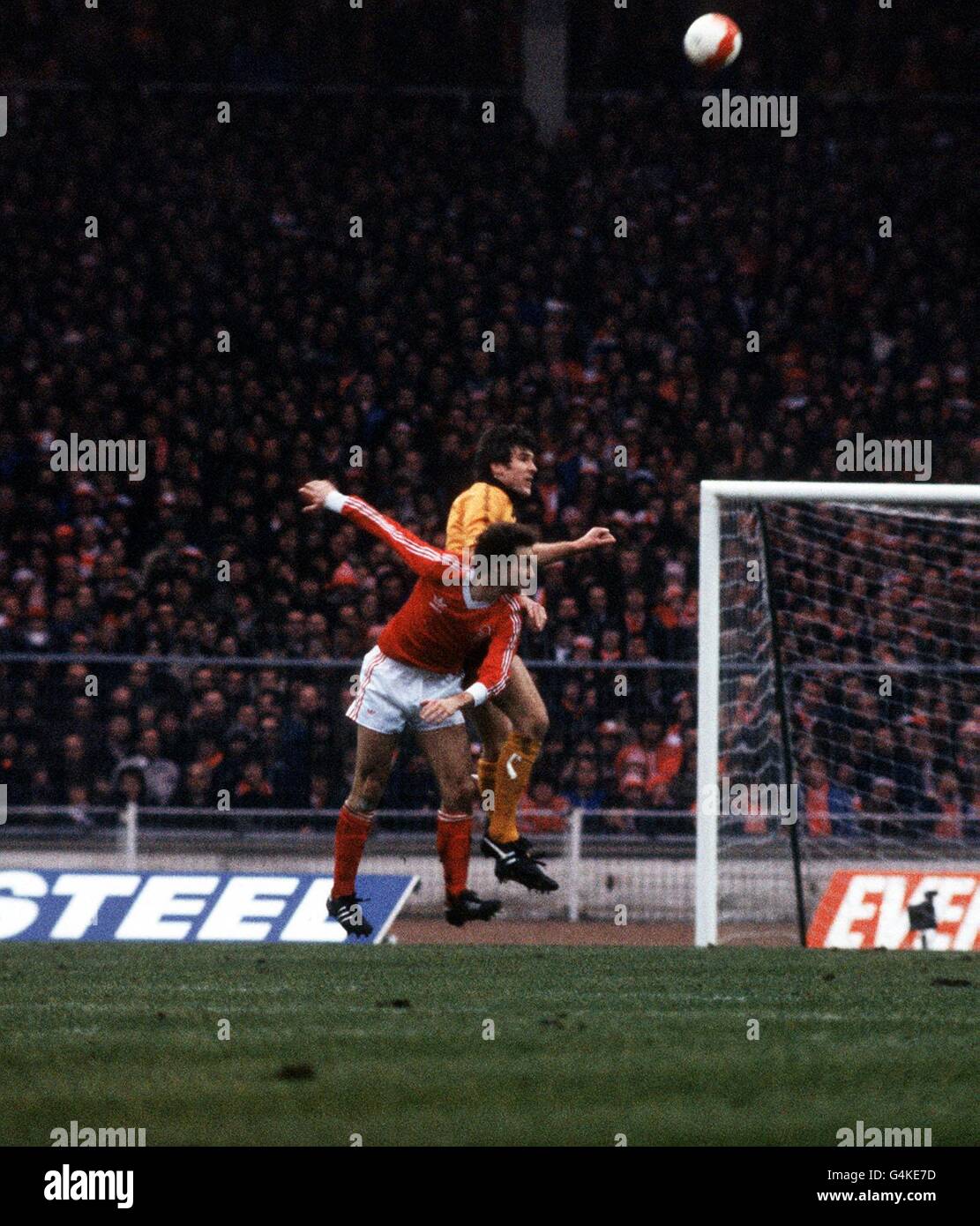 Emlyn Hughes (gold shirt) the Wolverhampton Wanderers captain jumps ...