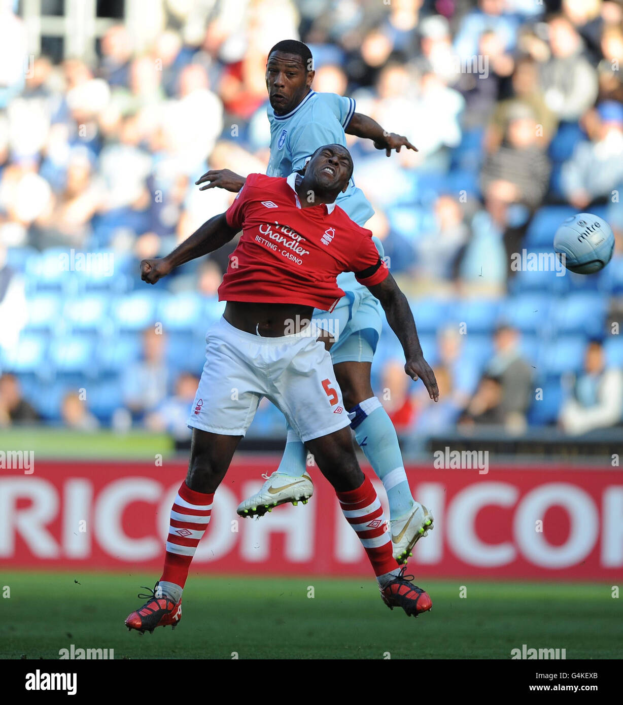 Coventry City's Clive Platt and Nottingham Forest's Wes Morgan battle ...