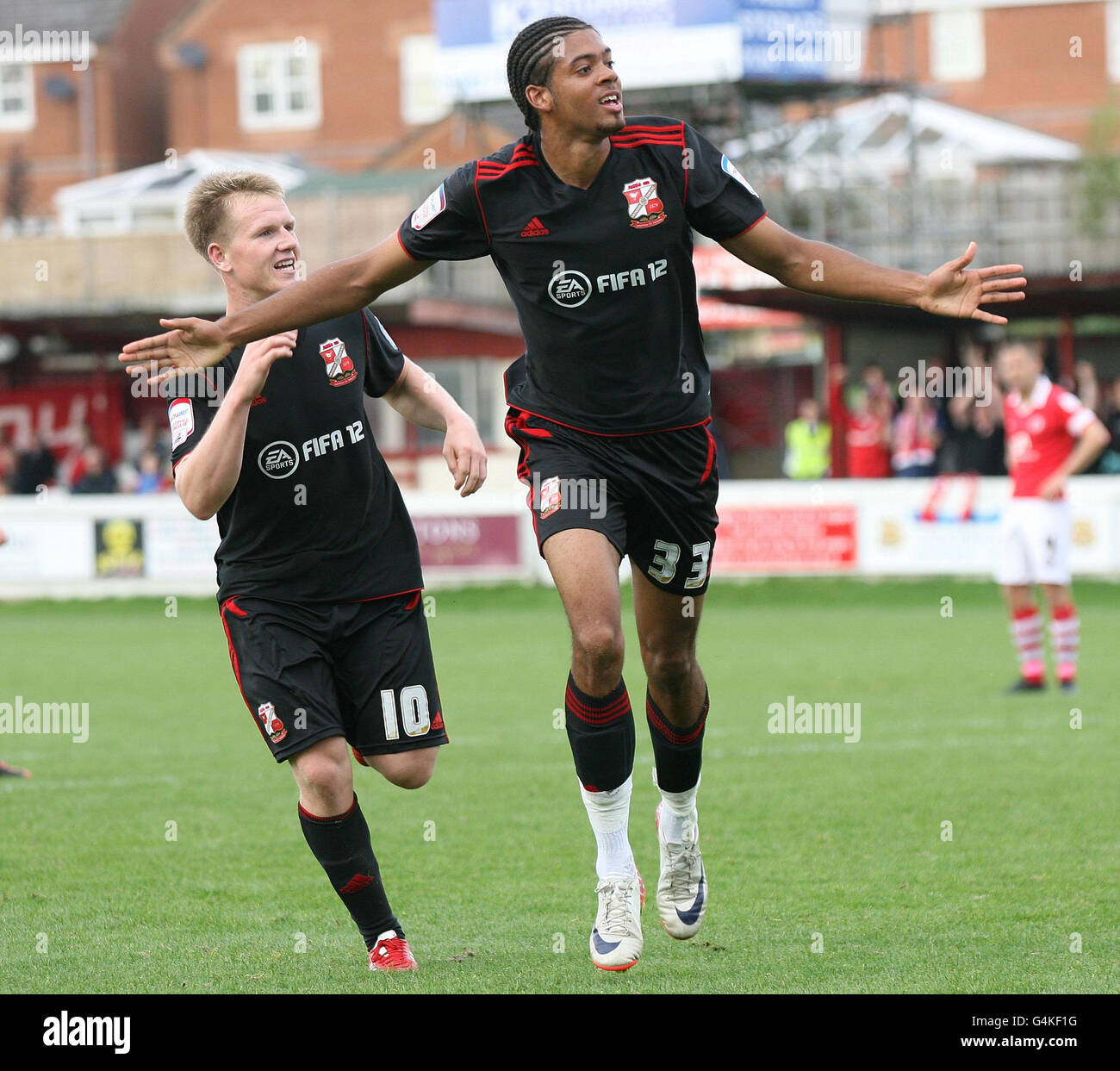 Swindon Town's Jake Jervis celebrates scoring his sides opening goal ...