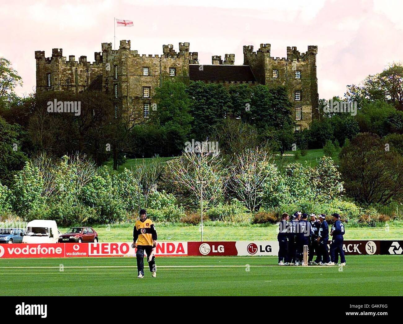 With Lumley Castle towering in the background, Durham's batsman Michael ...