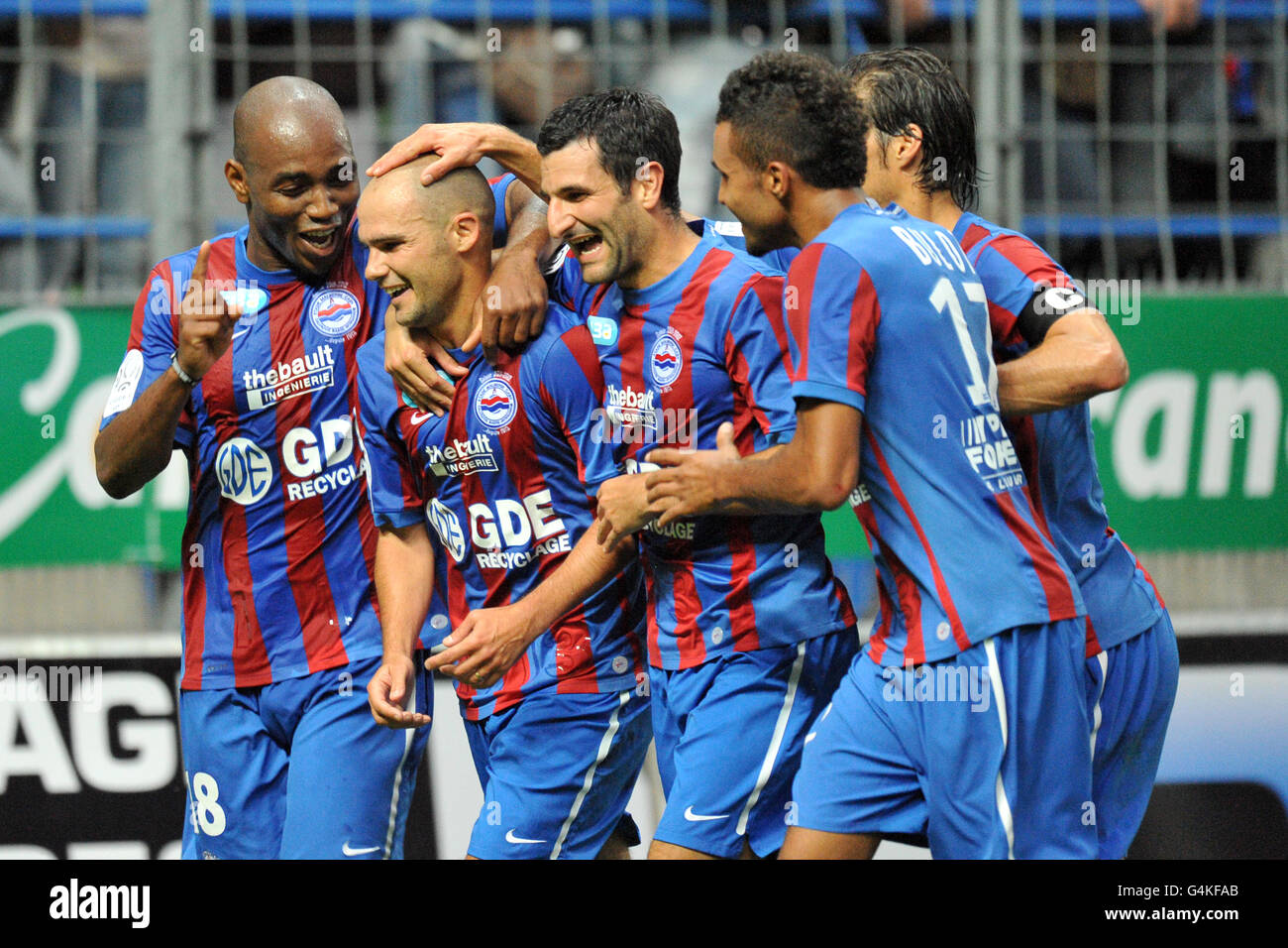 Caen's Benjamin Nivet (second left) celebrates his goal with team-mates ...
