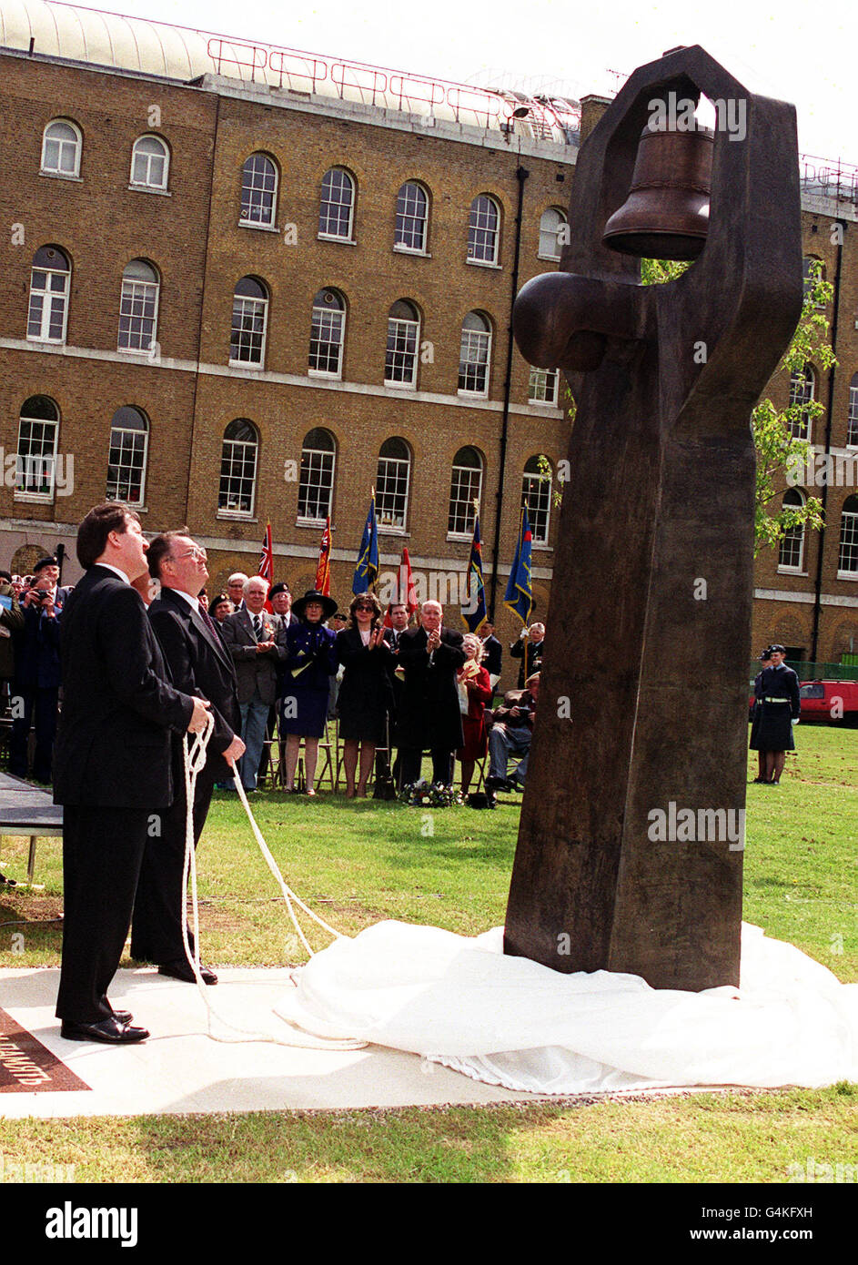 George Robertson, Defence Secretary,(l) paid tribute to Soviet citizens ...