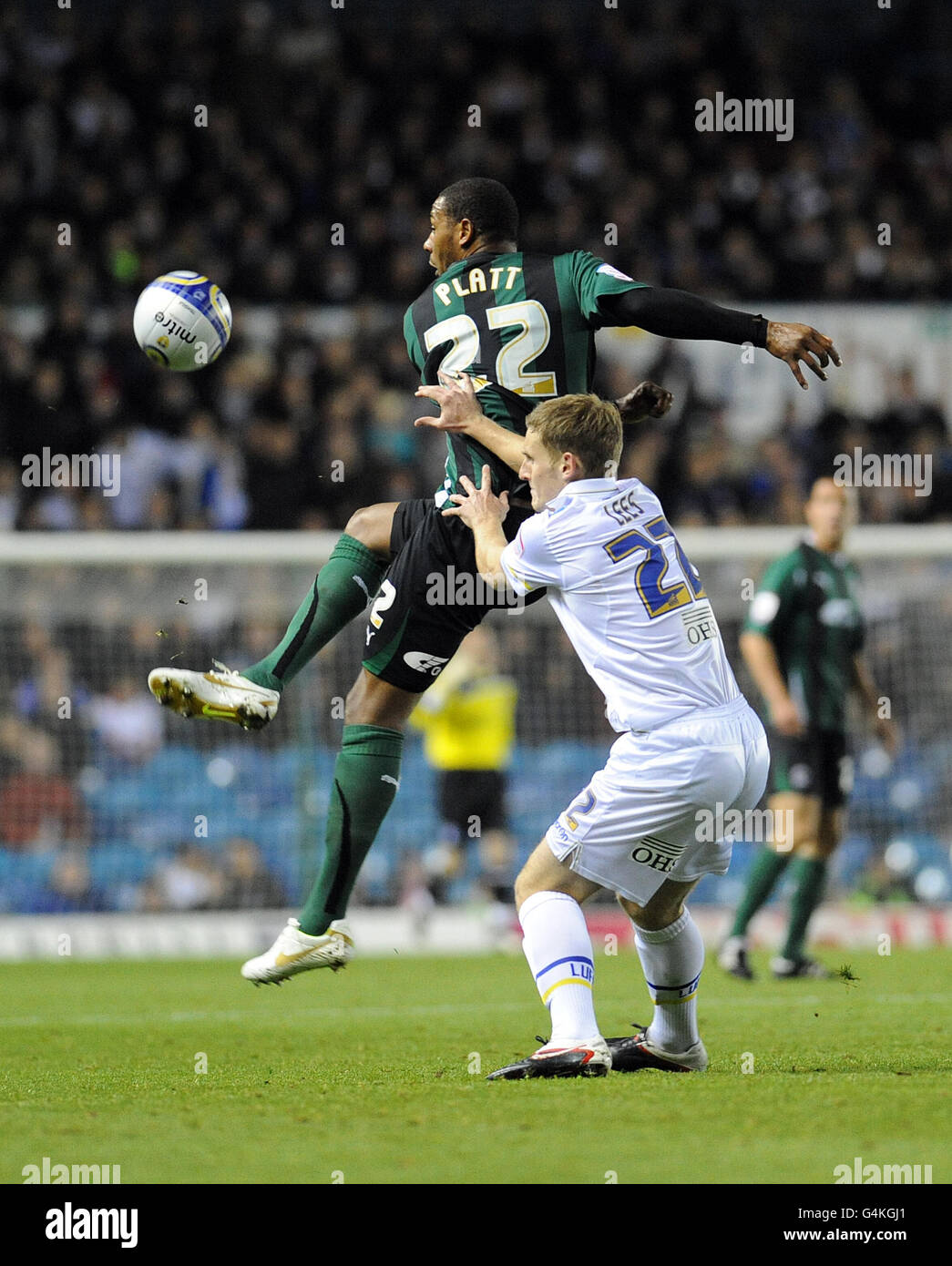 Coventry City' Clive Platt and Leeds United's Tom Lees (right) battle ...