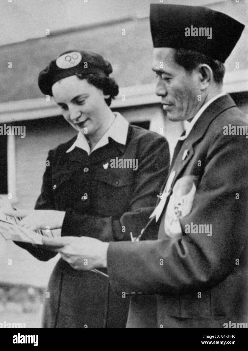 The Chef de Mission for Indonesia Mr R Maladi, confers with his ...