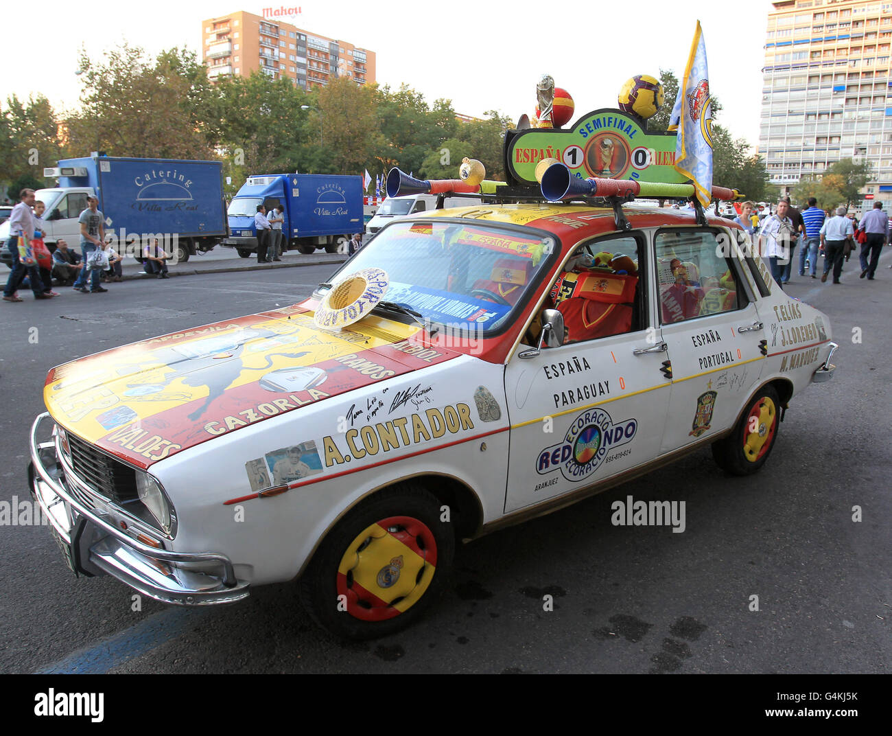 A car decorated in Real Madrid and Spain colours, memorabilia and ...