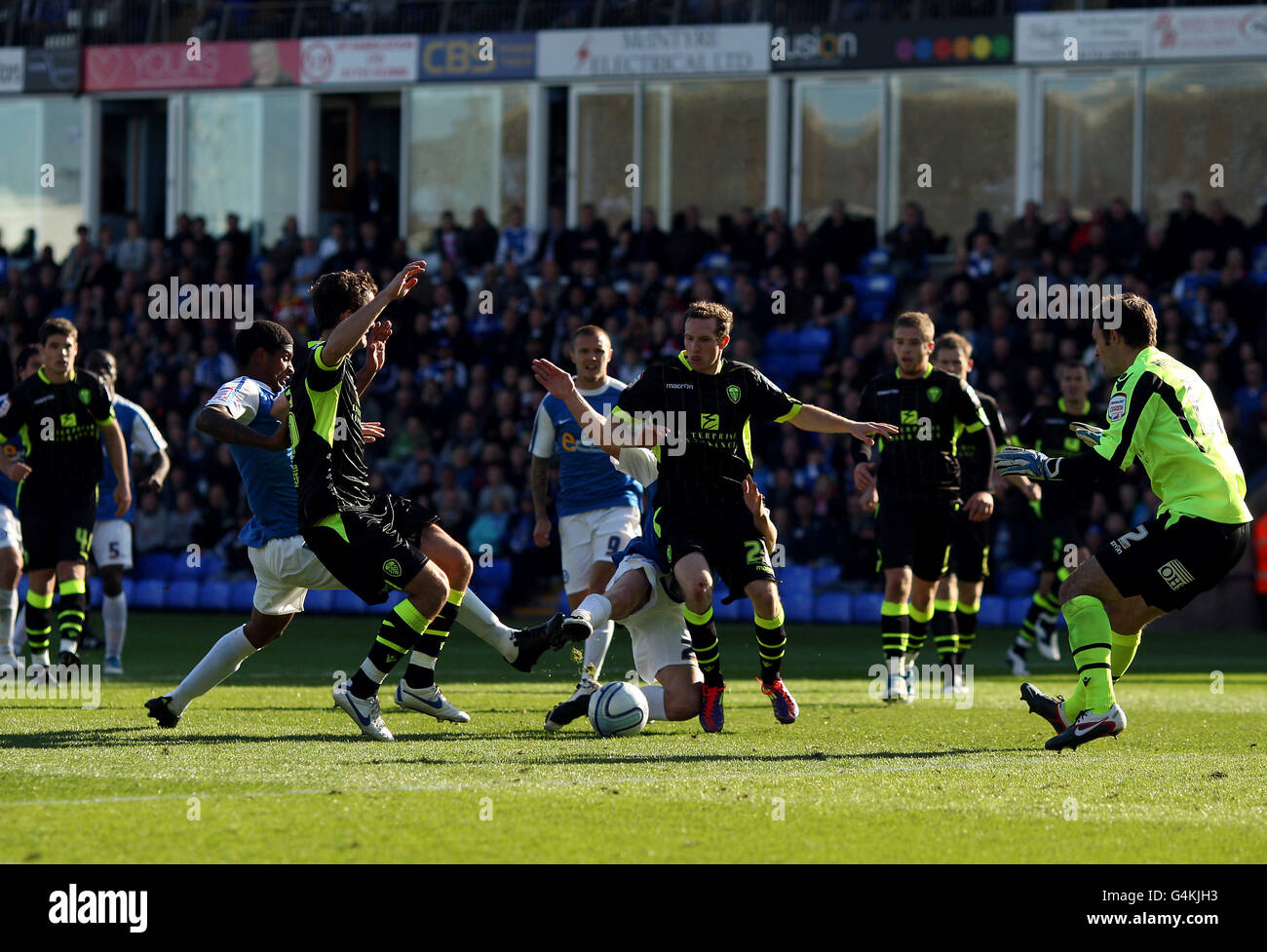 Peterborough United's Mark Little (left) stretches to score their ...