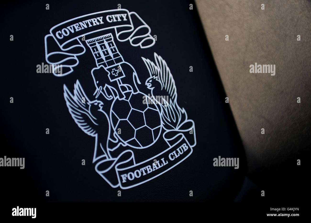 General view of a the Coventry City club logo on a seat in the dug-out ...