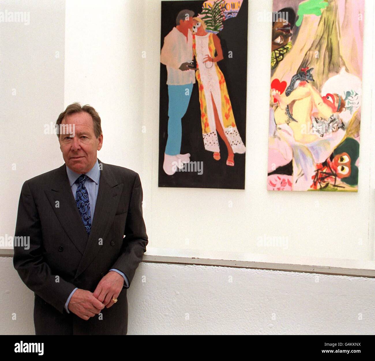 Royal College of Art's Provost Lord Snowdon in front of two paintings ...
