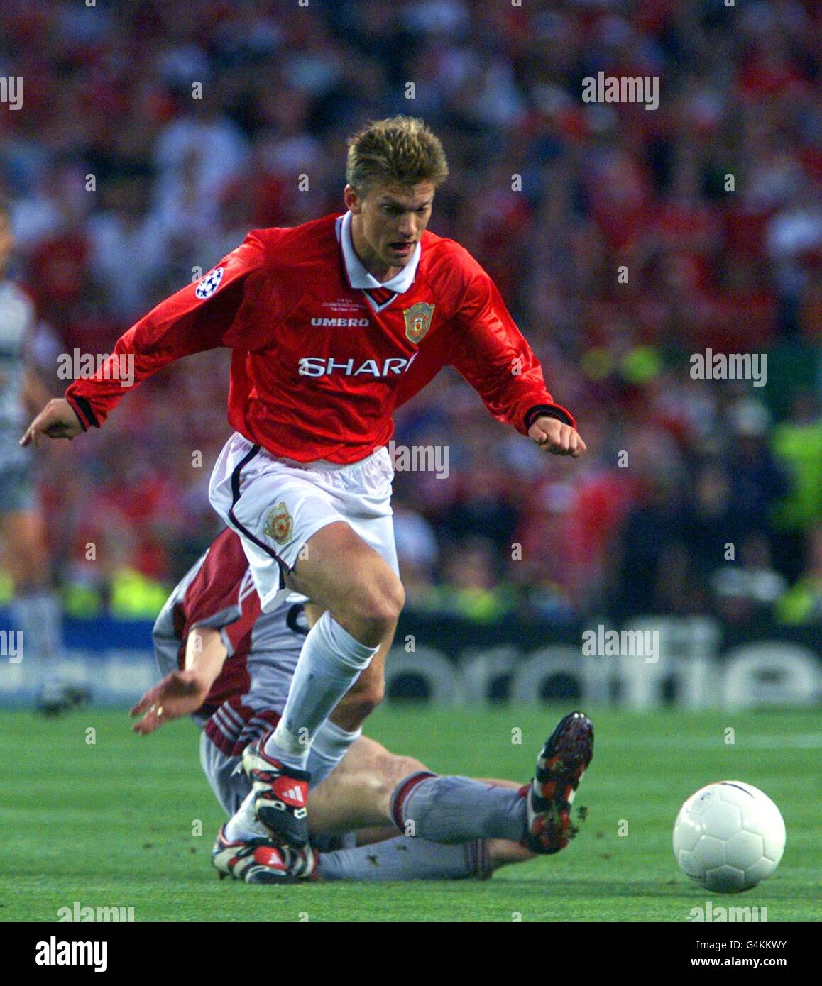 Manchester United's Jesper Blomqvist evades a challenge from a Bayern ...