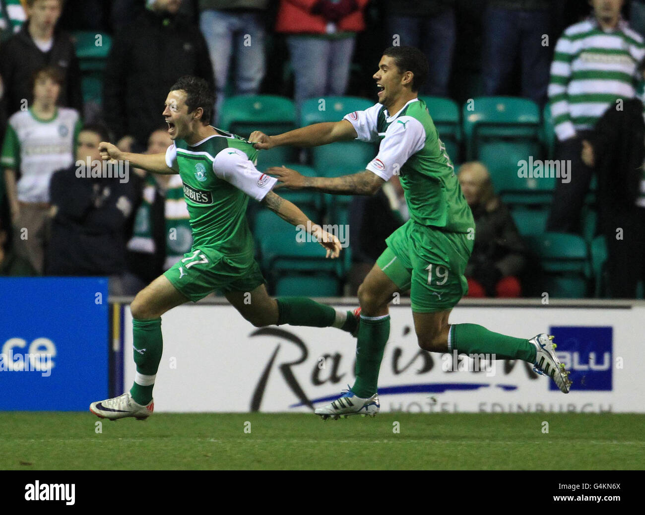 Hibernian's Ivan Sproule (left) celebrates scoring the opening goal ...