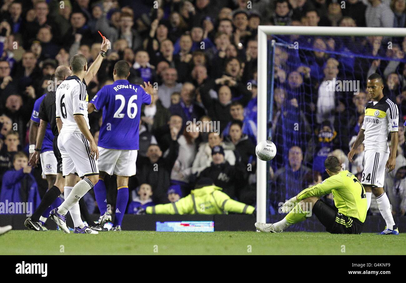 Chelsea goalkeeper Ross Turnbull (right) is shown a red card for ...
