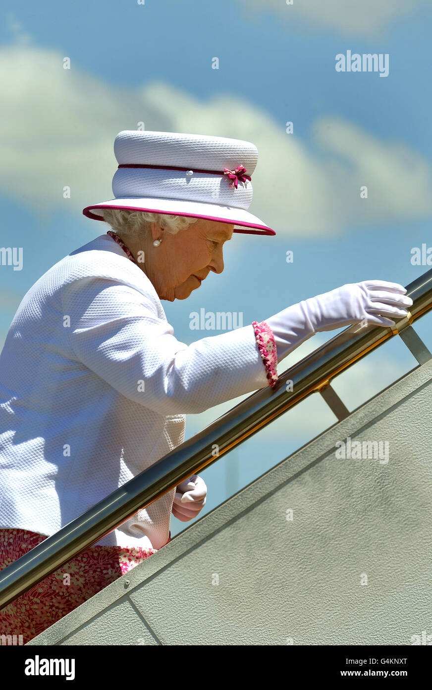 Queen Elizabeth II climbs the aircraft steps, at Perth International ...