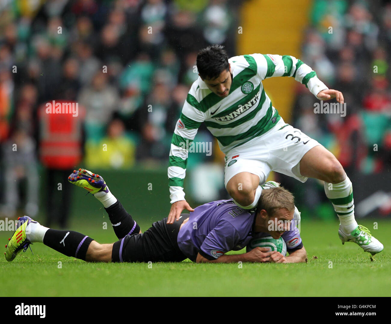 Celtic's Beram Kayal challenges Hibernian's Daniel Galbraith during the ...
