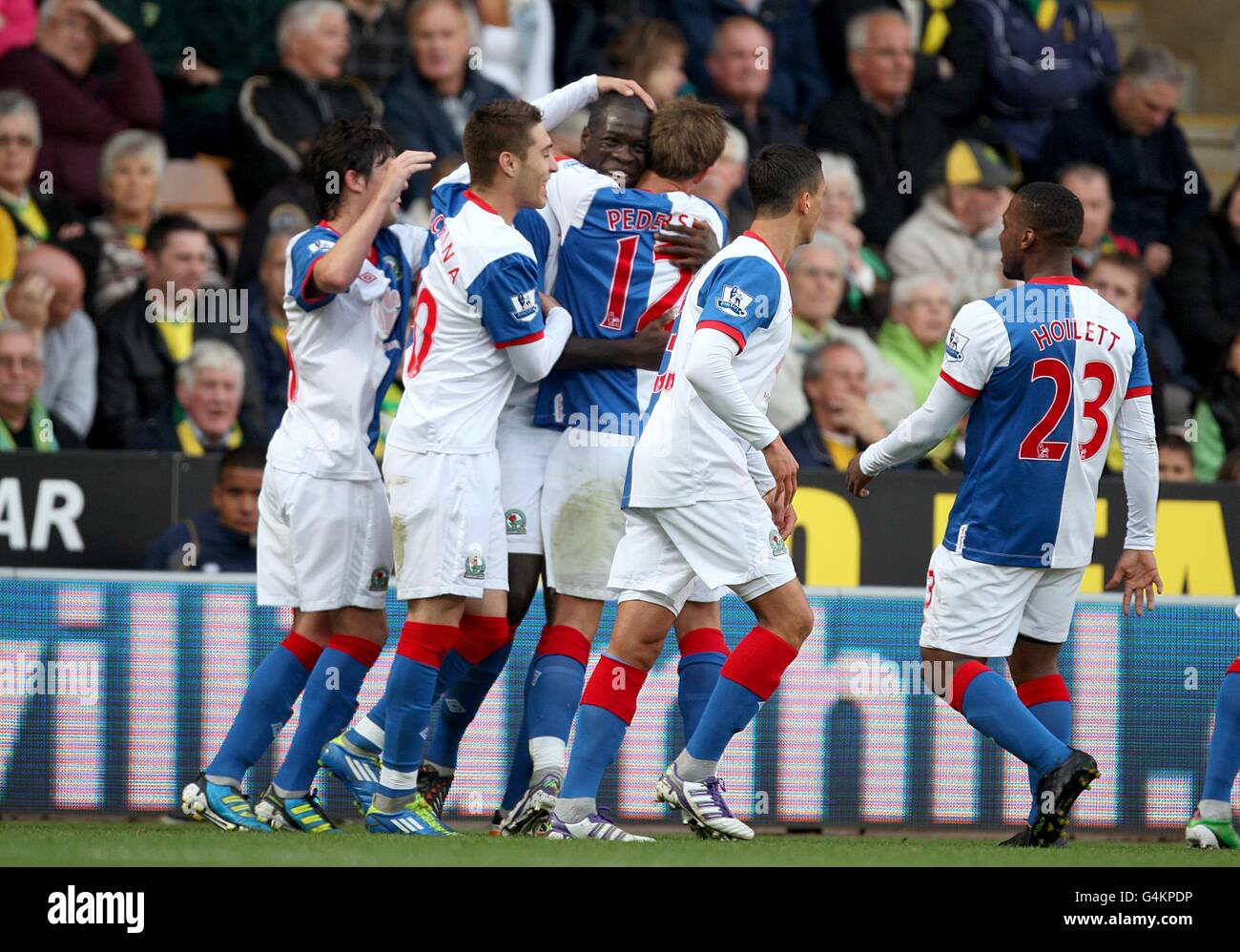 Blackburn Rovers' Christopher Samba (centre) celebrates with his team ...