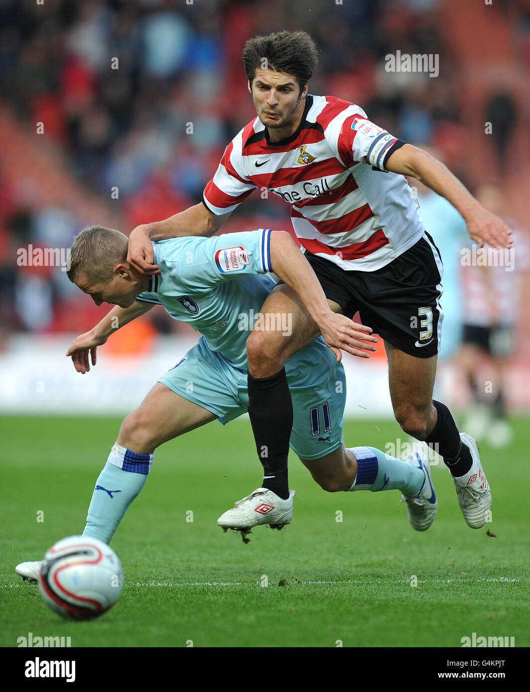 Coventry City's Gary McSheffrey and Doncaster Rovers' (right) George ...