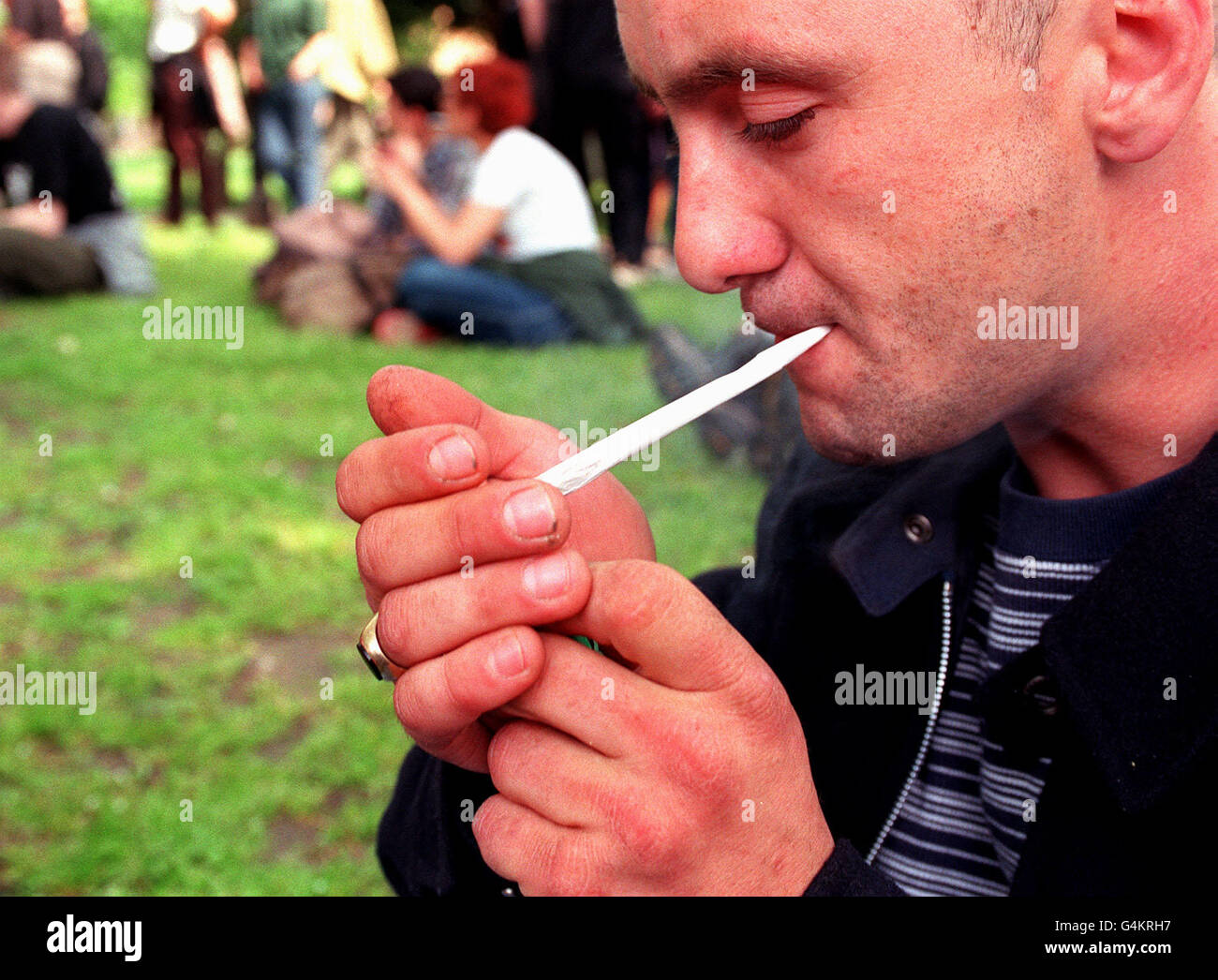 Semi profile smoking joint spliff marijuana drugs protesting hi-res ...