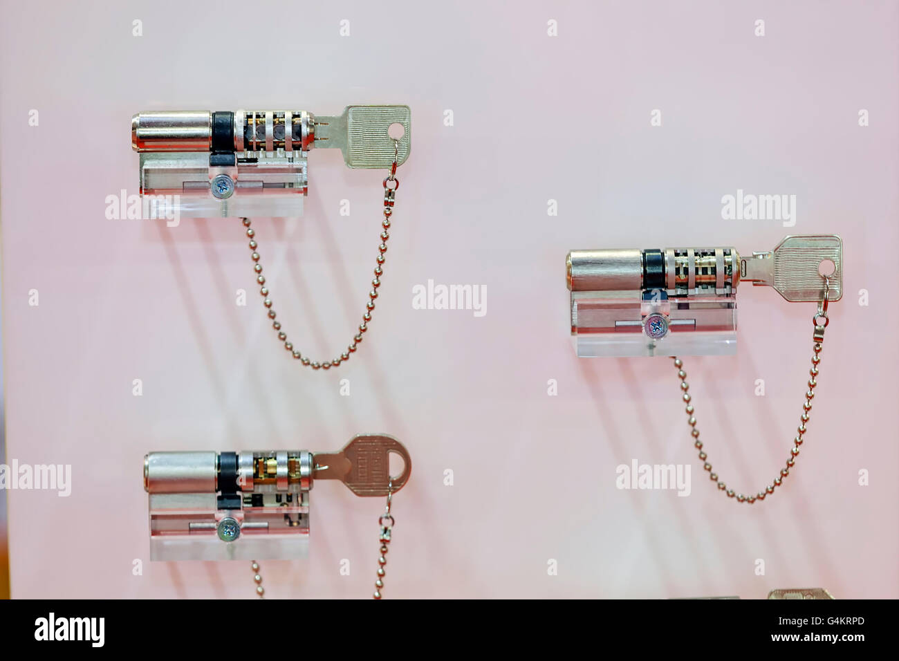 Metal door handle mechanism on exhibition wall Stock Photo - Alamy