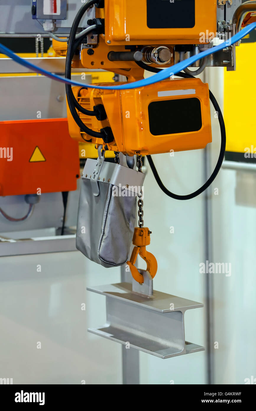 Closeup new hook and handle for construction with mechanism; note ...