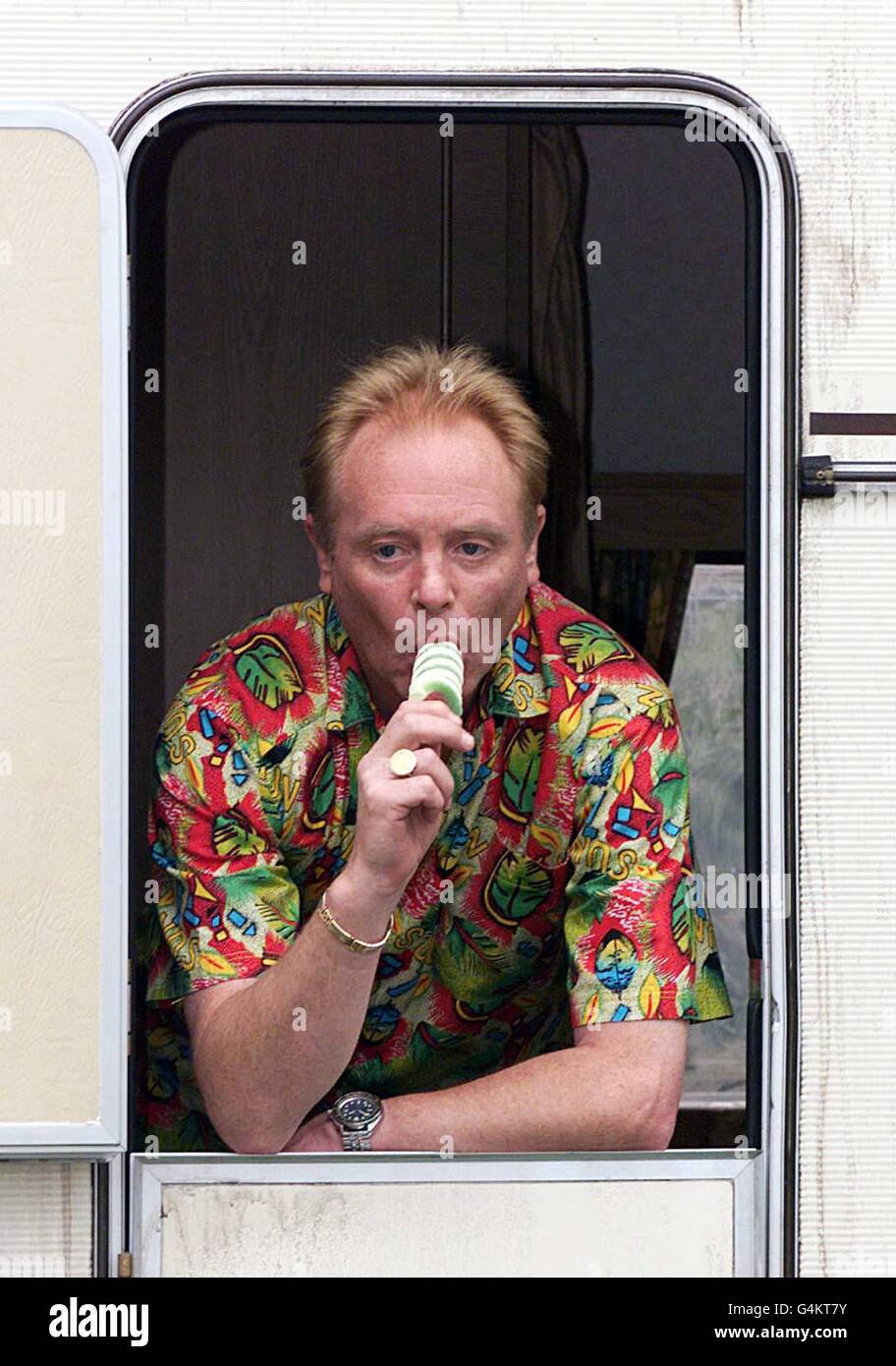 Actor Bruce Jones, who plays Les Battersby, waves during filming of ...