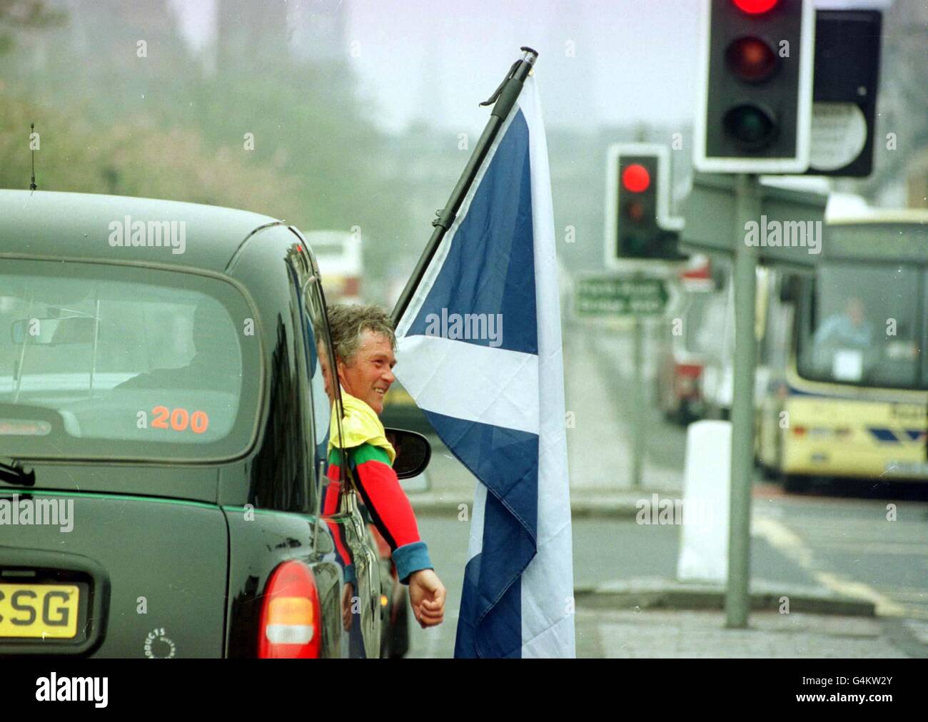 Carrying scottish flags hi-res stock photography and images - Alamy