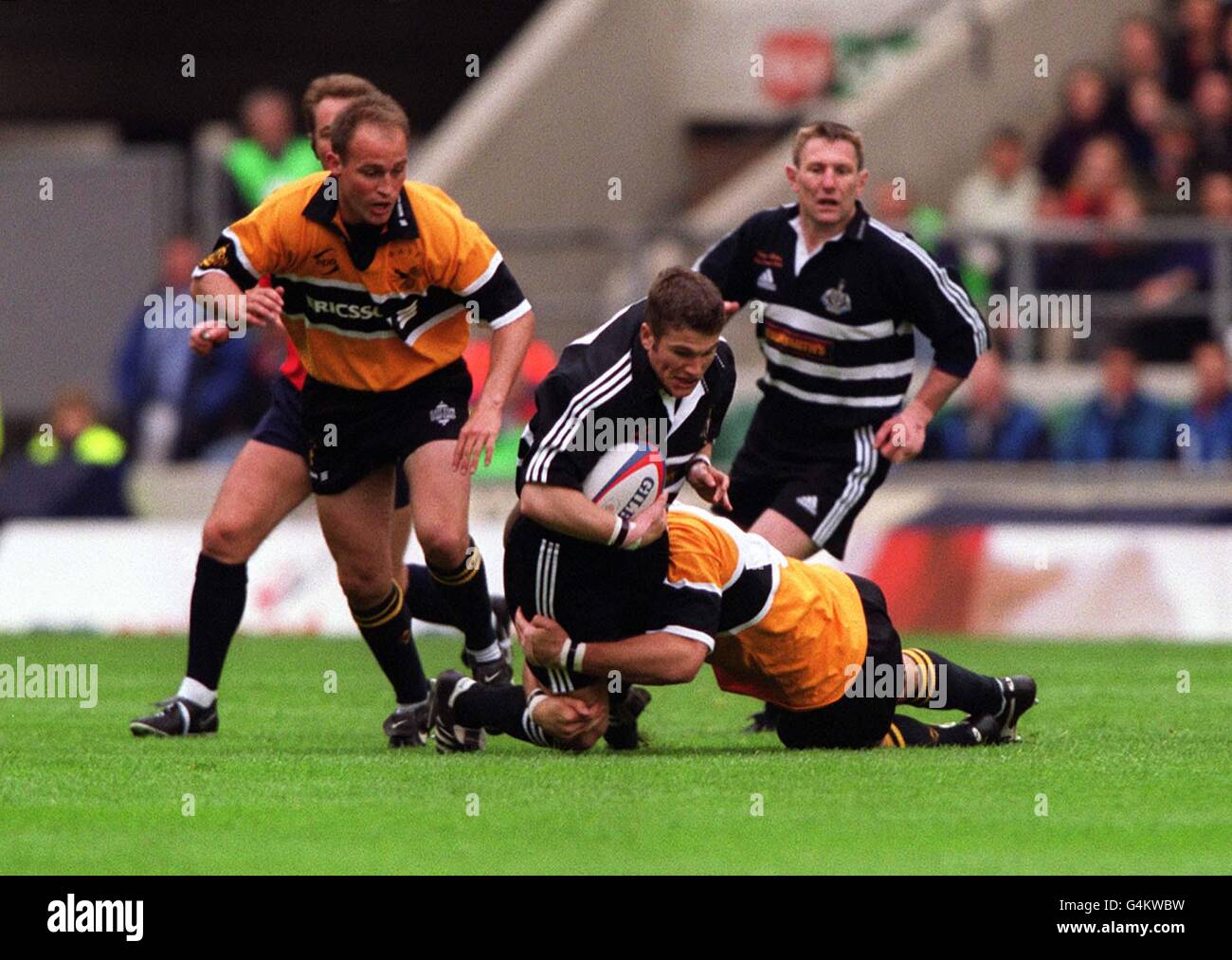 RUGBYU Wasps v Falcons2. Newcastle Falcons Tom May is tackled by an ...