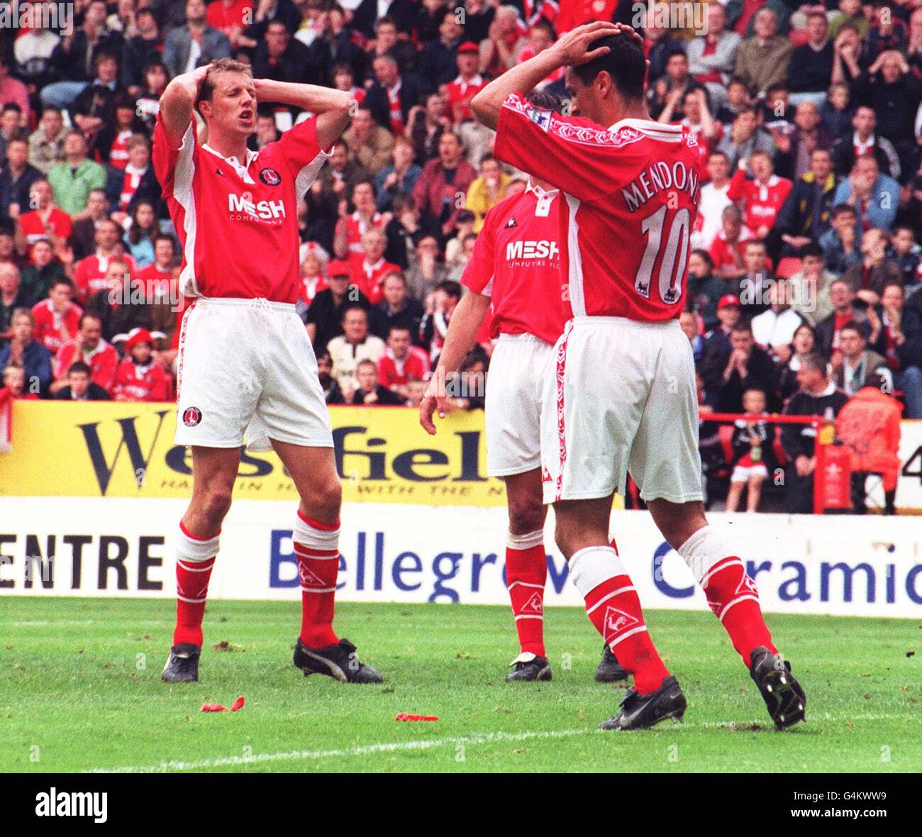 Charlton's Carl Tiler (L) and Clive Mendonca hold their heads after a ...