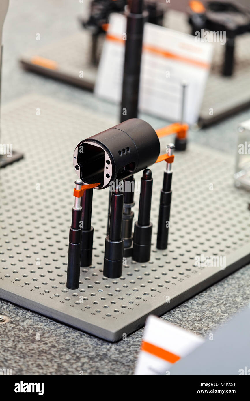 Closeup new design of parts for machine on exhibition show; note ...