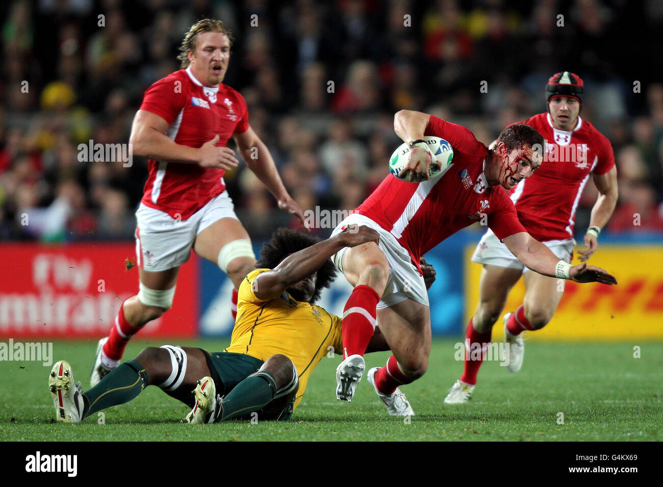 Wales George North is tackled by Australia's Radike Samo during the ...