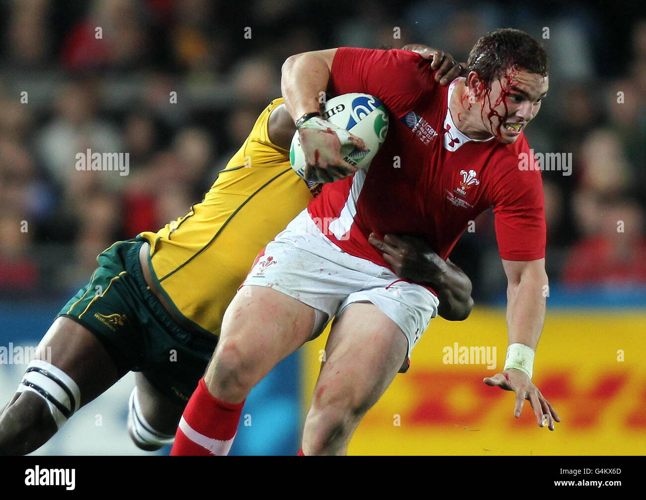 Wales George North is tackled by Australia's Radike Samo during the ...