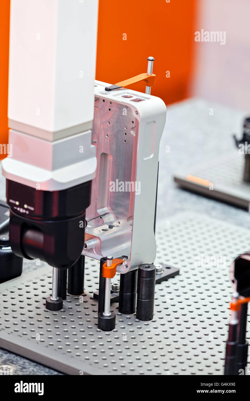 Closeup new design of parts for machine on exhibition show; note ...