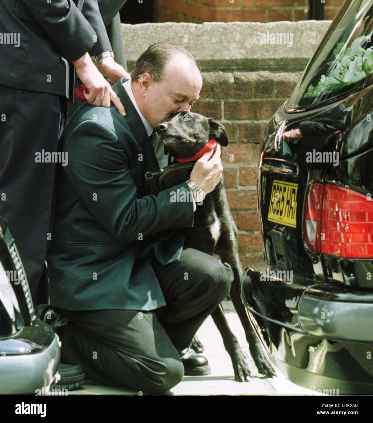 Mark Piggin and John Light's dog Ben outside John's funeral service at ...
