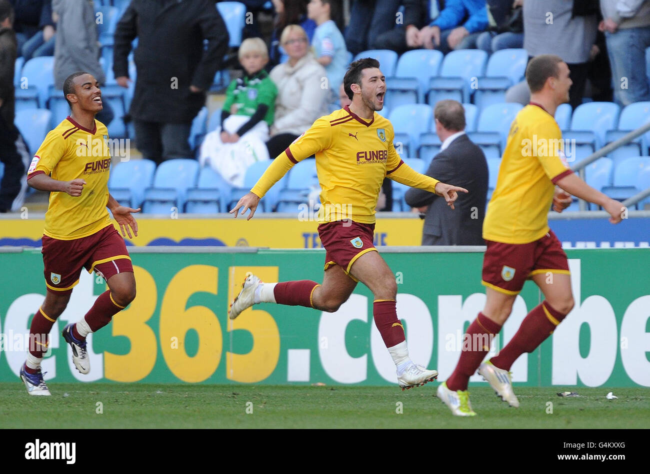 Burnley's Charlie Austin (centre) celebrates after scoring the winning ...