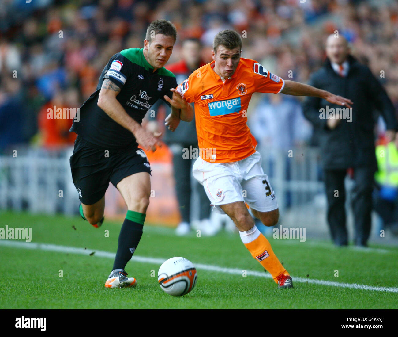 Blackpool's Callum McManaman and Nottingham Forest's Luke Chambers ...