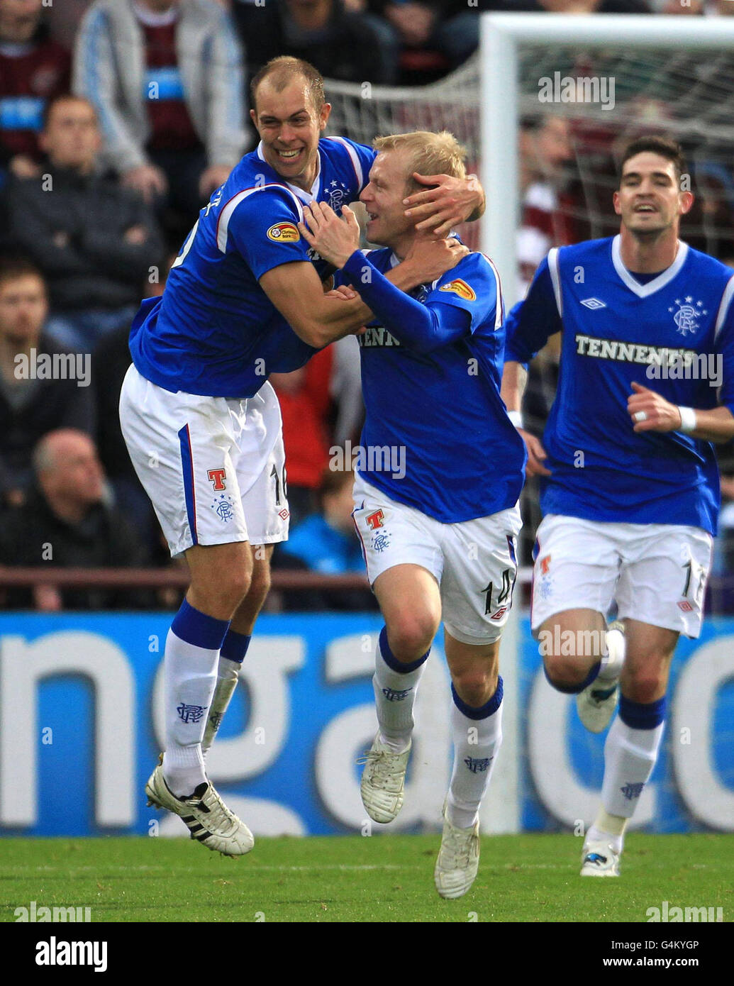 Ranger's Steven Naismith (centre) celebrates scoring opening goal with ...