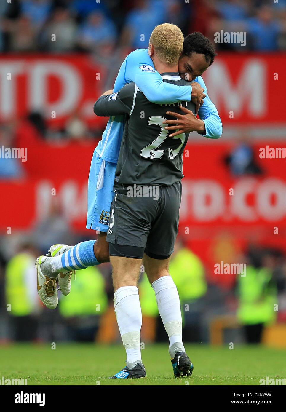 Manchester citys joleon lescott joe hart celebrate edin dzekos goal hi ...