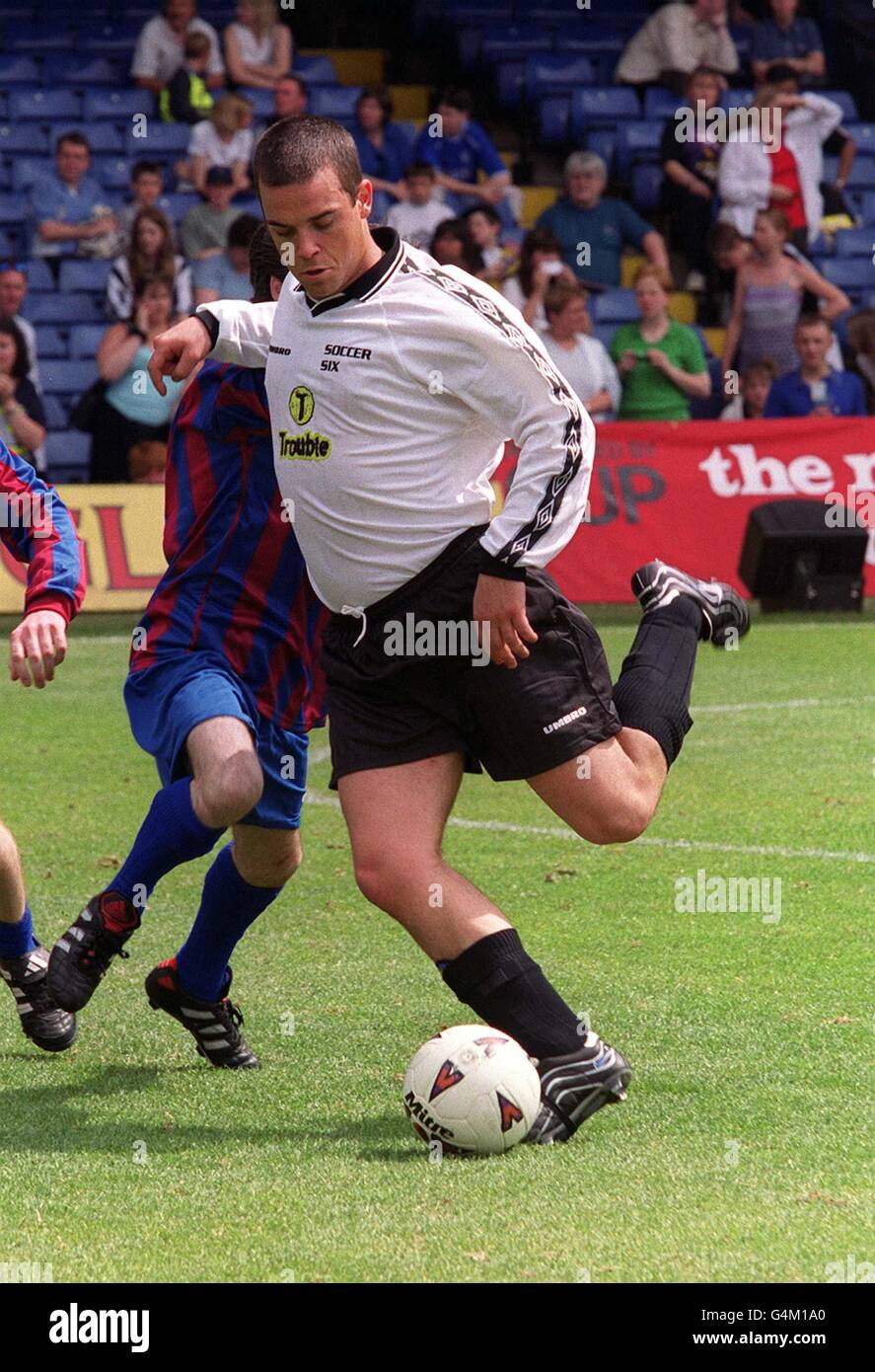Football music ball semi profile robbie williams hi-res stock ...