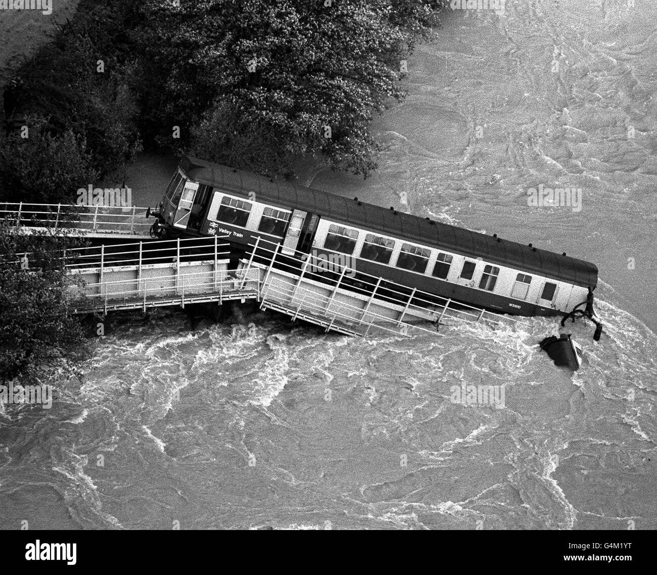 Front carriage plunged into swollen river Black and White Stock Photos ...