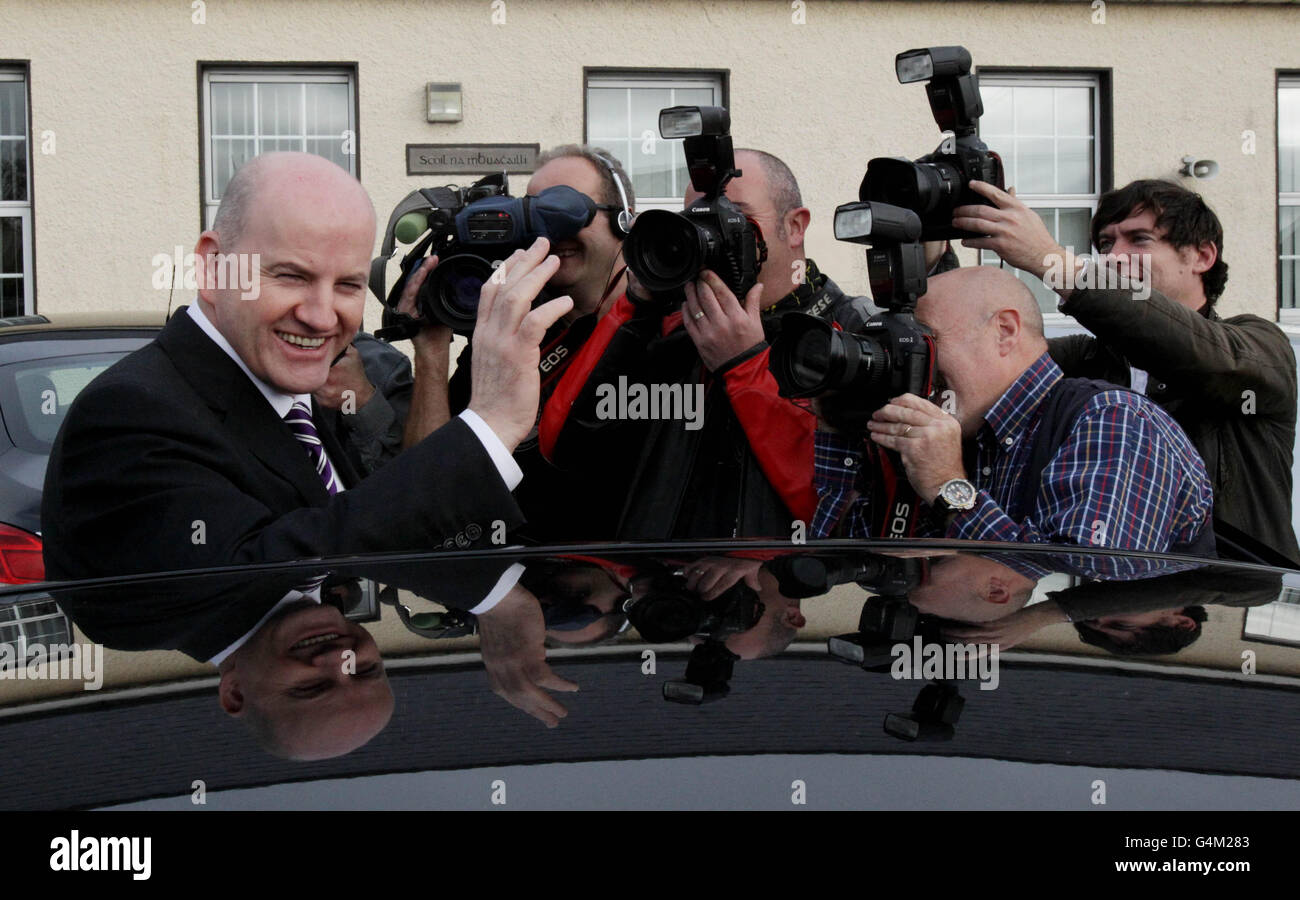 Irish presidential candidate Sean Gallagher, waves for the media after ...