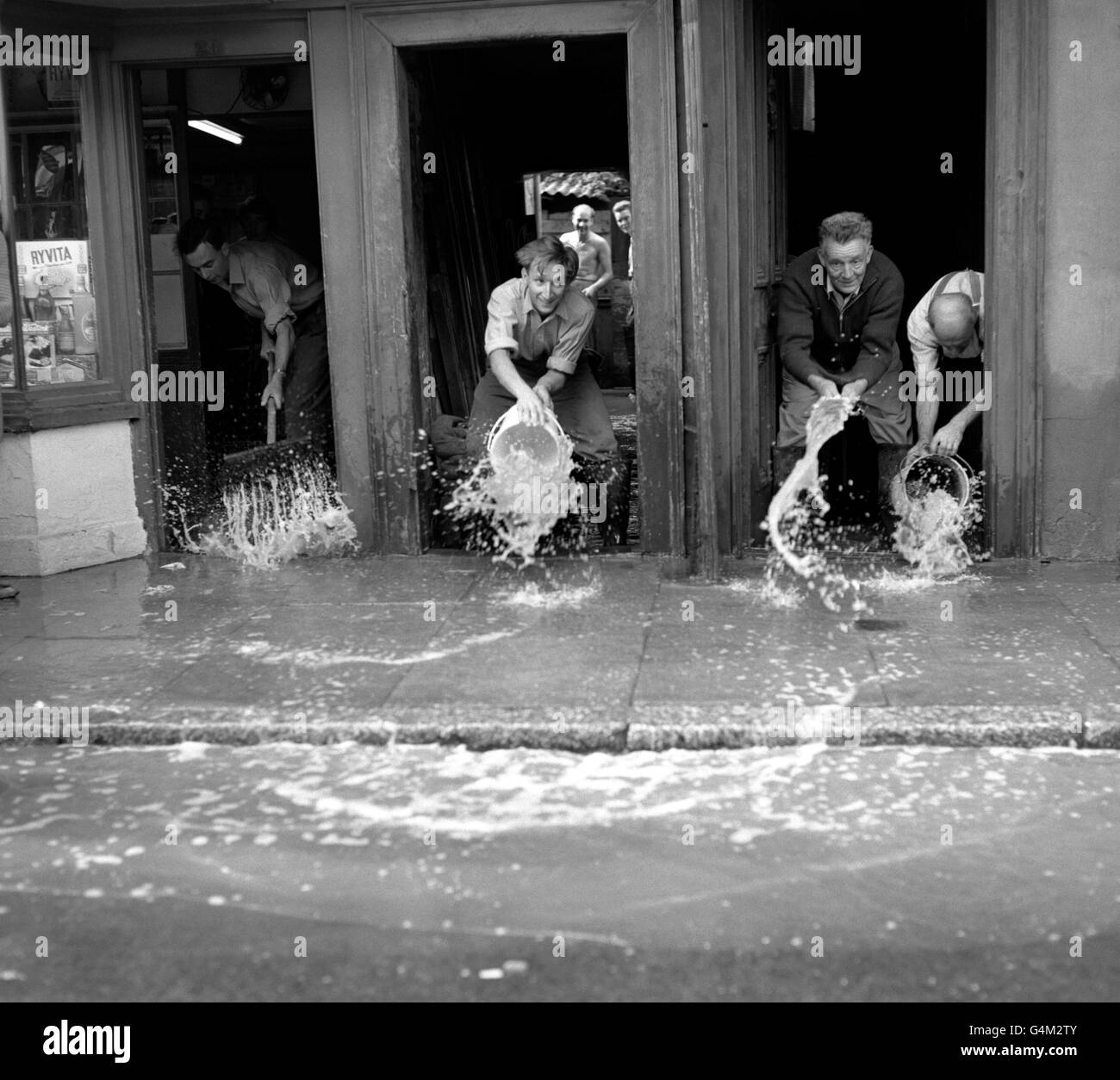 Water buckets in Black and White Stock Photos & Images - Alamy