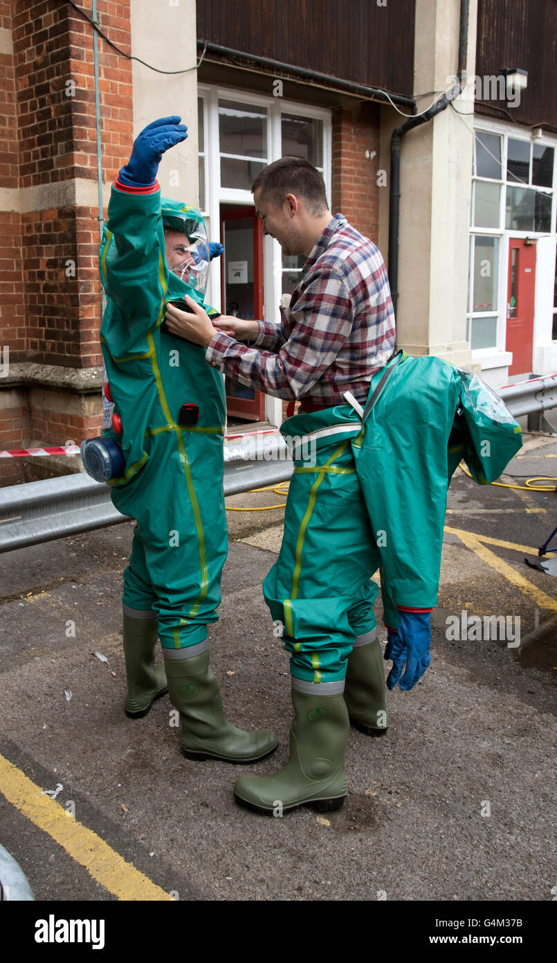 Decontamination suit hi-res stock photography and images - Alamy