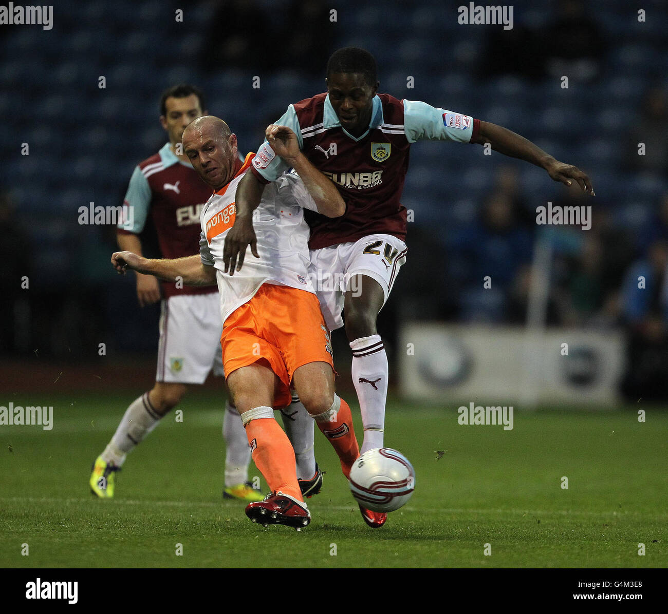 Burnley's Marvin Bartley and Blackpool's Stephen Crainey (left) battle ...