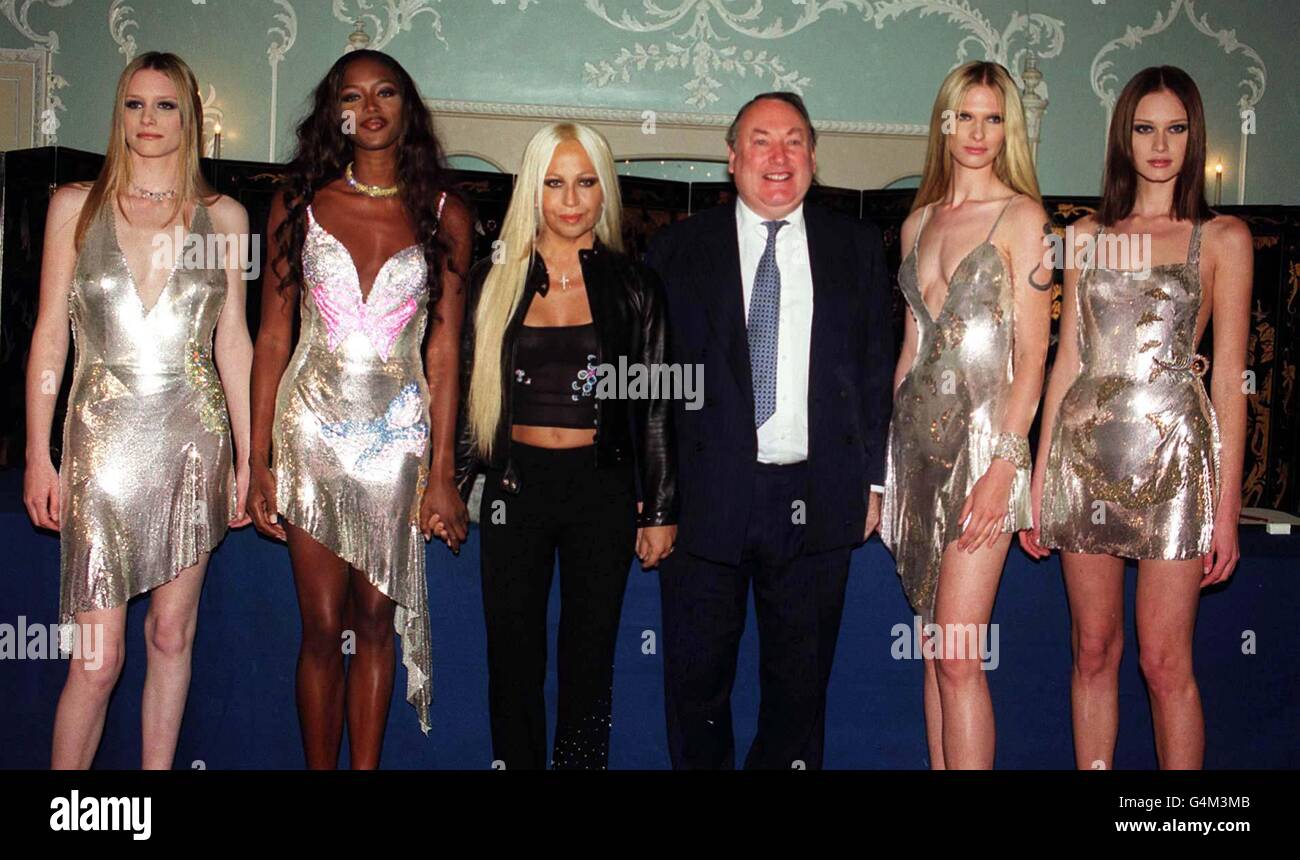 Miss Versace poses with top models wearing jewellery a press conference ...