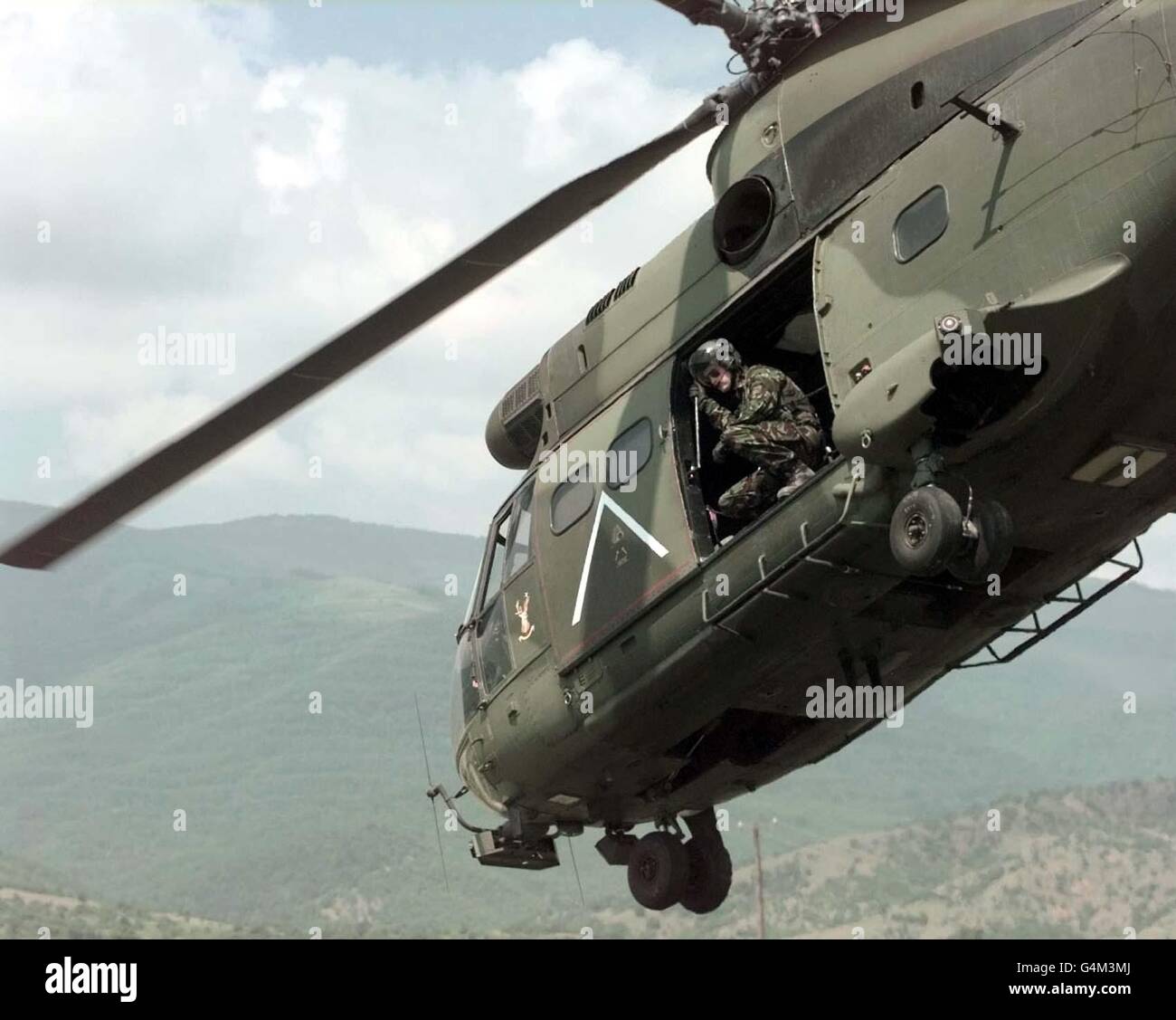 A RAF Puma Helecopter of the 33 Squadron swoops low over the Macedonian ...