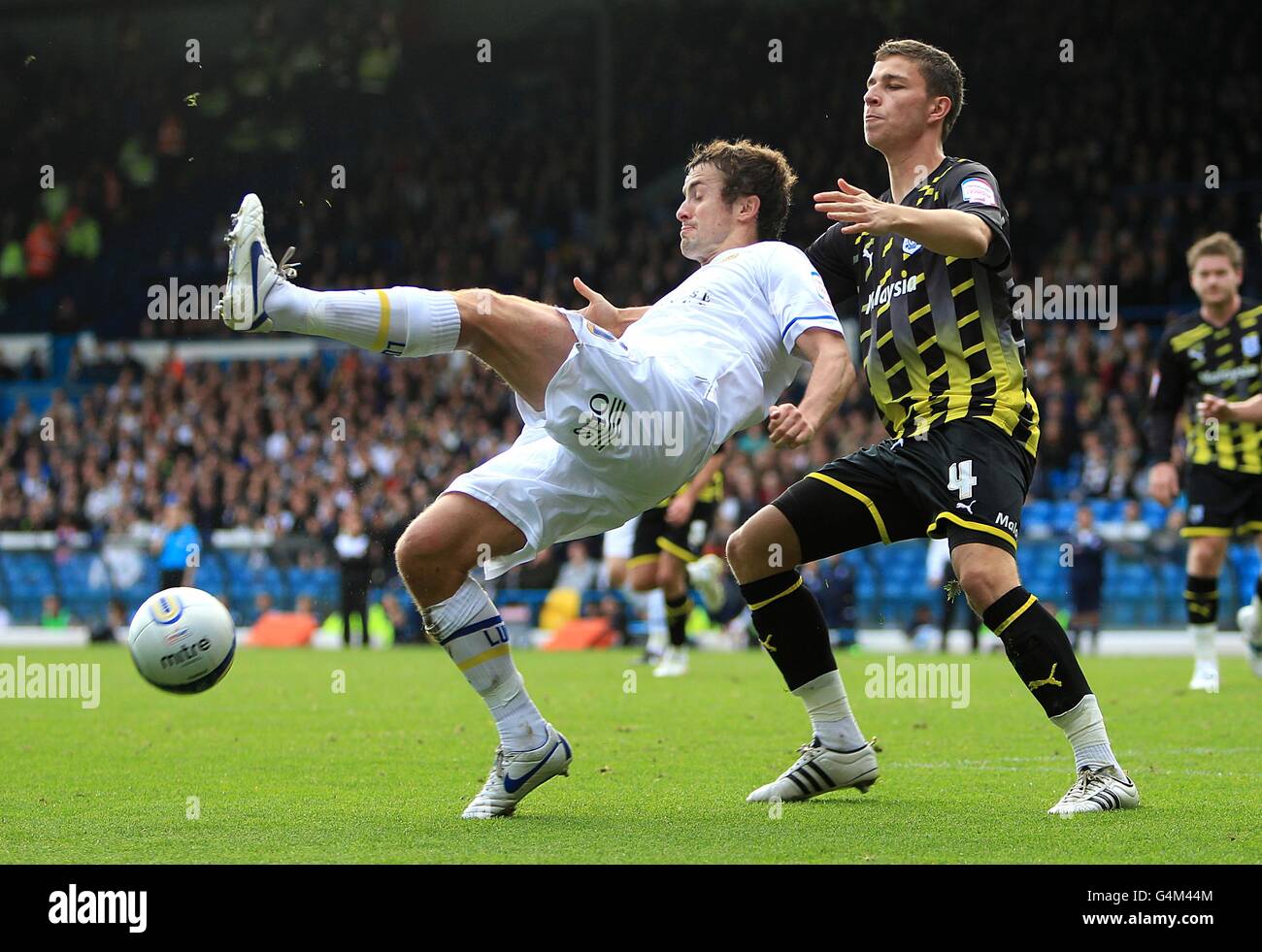 Cardiff City's Filip Kiss (right) and Leeds United's Danny Pugh battle ...
