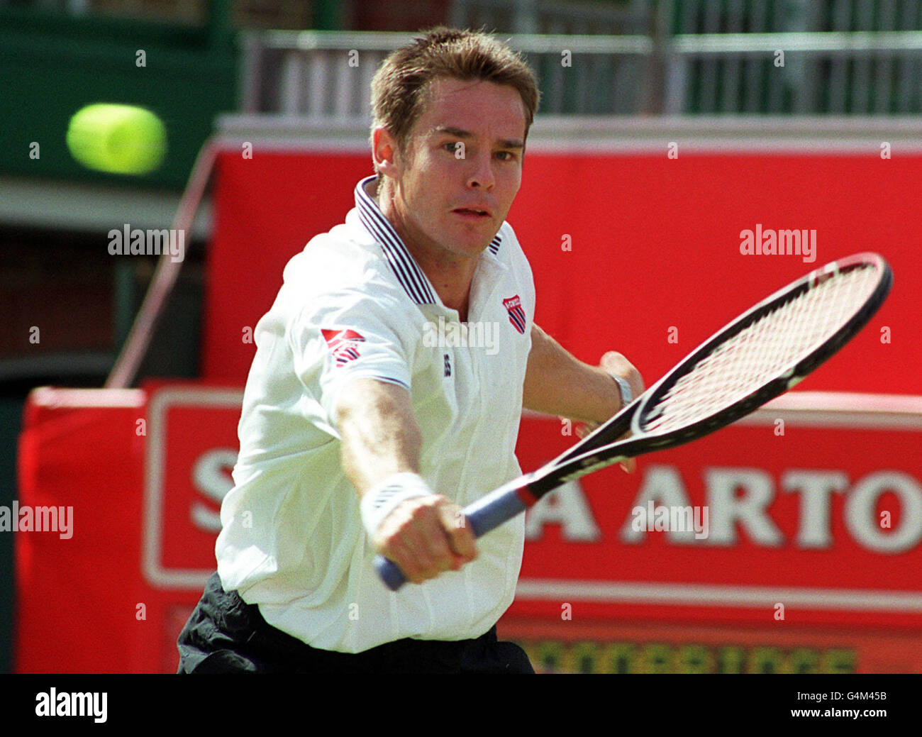 Todd Woodbridge (Australia) returns to Pete Sampras (USA) during the ...