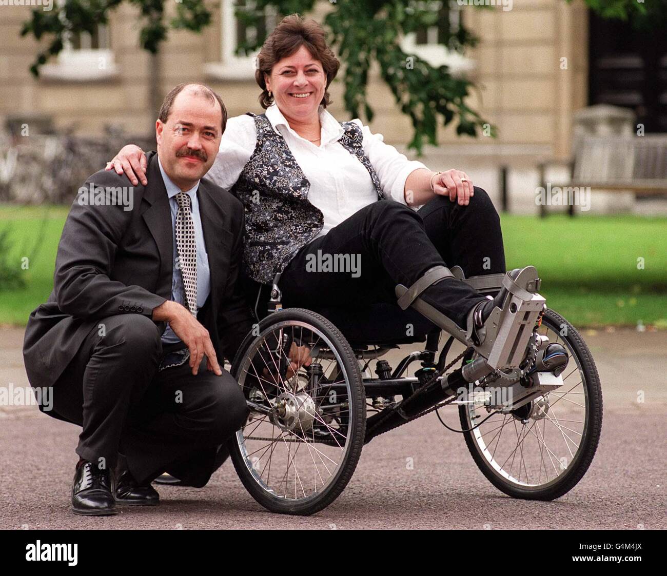 Julie Hill with husband Kevin. Mrs Hill who is paralysed from the waist ...
