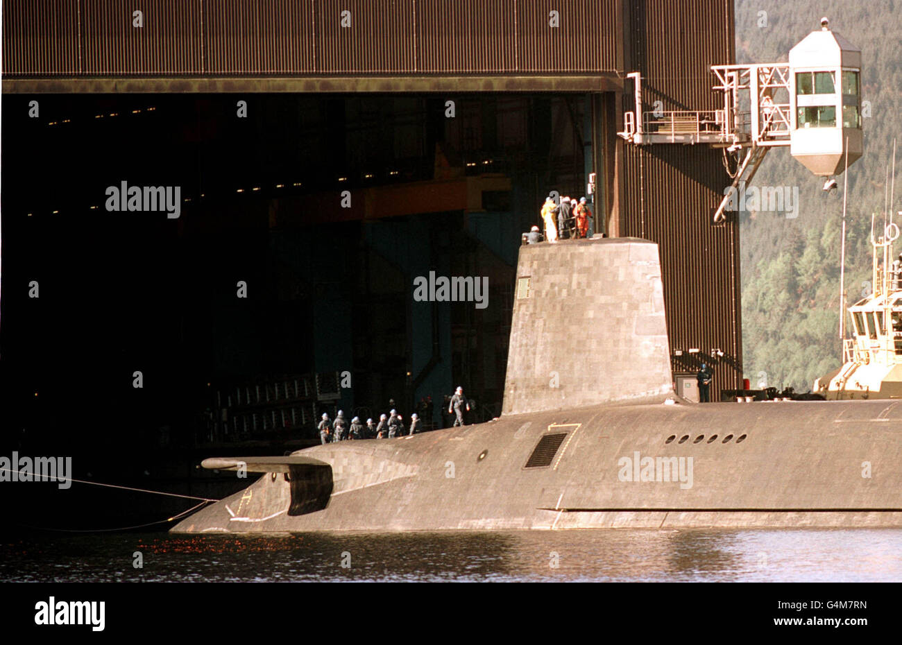 Servicemen stand aboard the final trident nuclear submarine hms ...