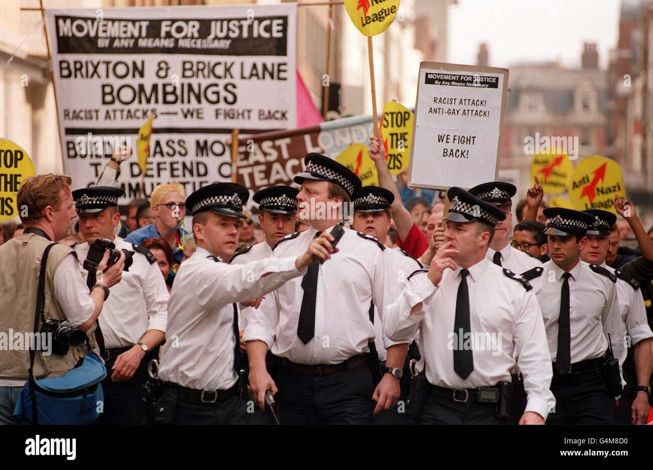 Police organise the route for demonstrators marching through London in ...