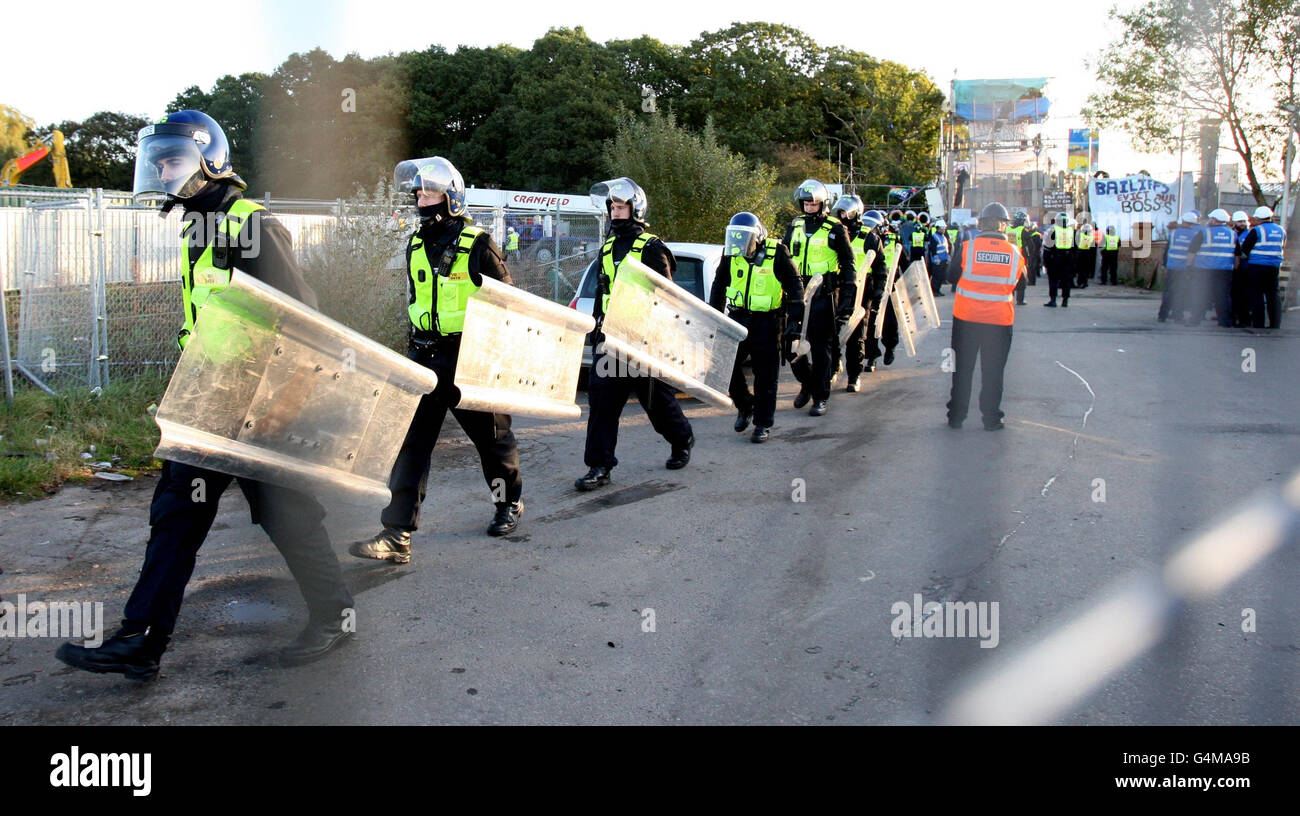 Police officers at Dale Farm in Essex where supporters have clashed ...