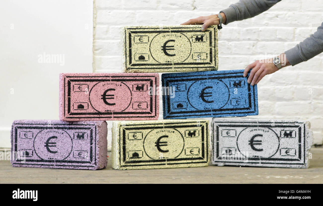 A curator lifts Monopoly Breeze Blocks in to position in the South ...